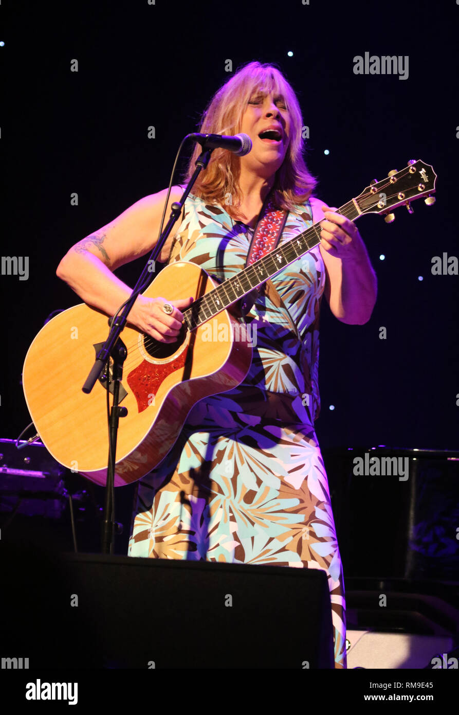 Musician Rickie Lee Jones is shown performing on stage during a live ...