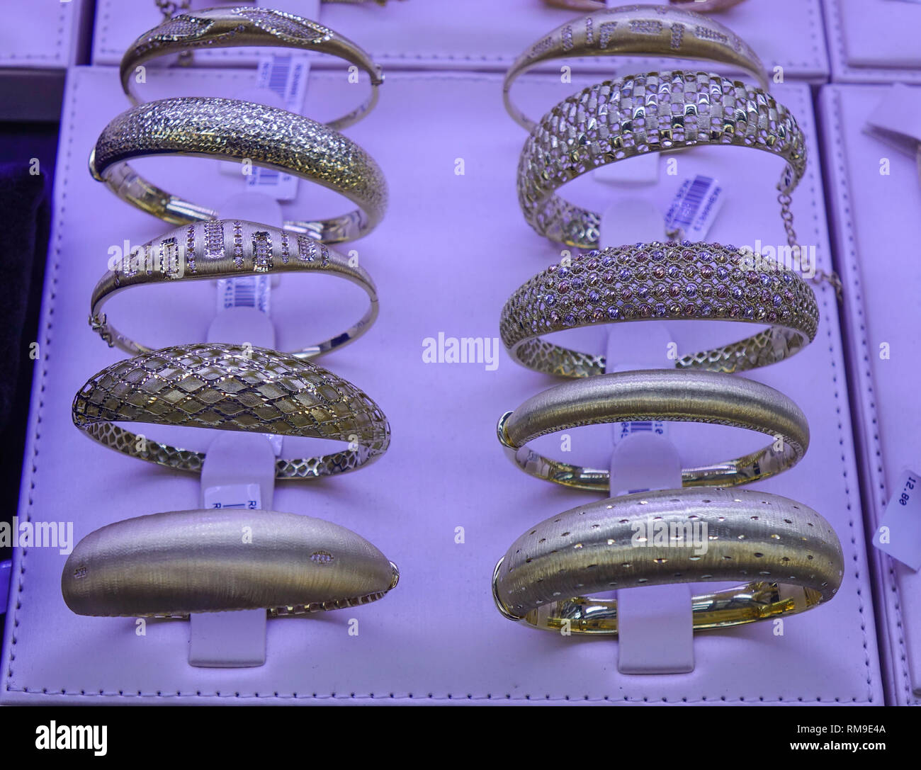 Dubai, UAE - Dec 6, 2018. Gold jewelry in the display window of a ...