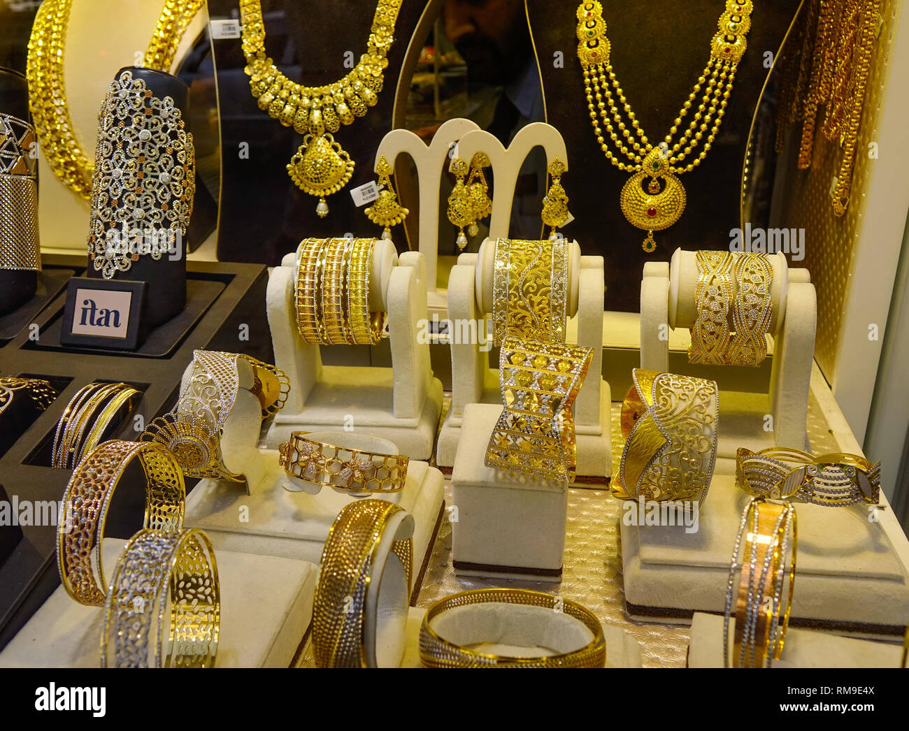 Dubai, UAE - Dec 6, 2018. Gold jewelry in the display window of a ...