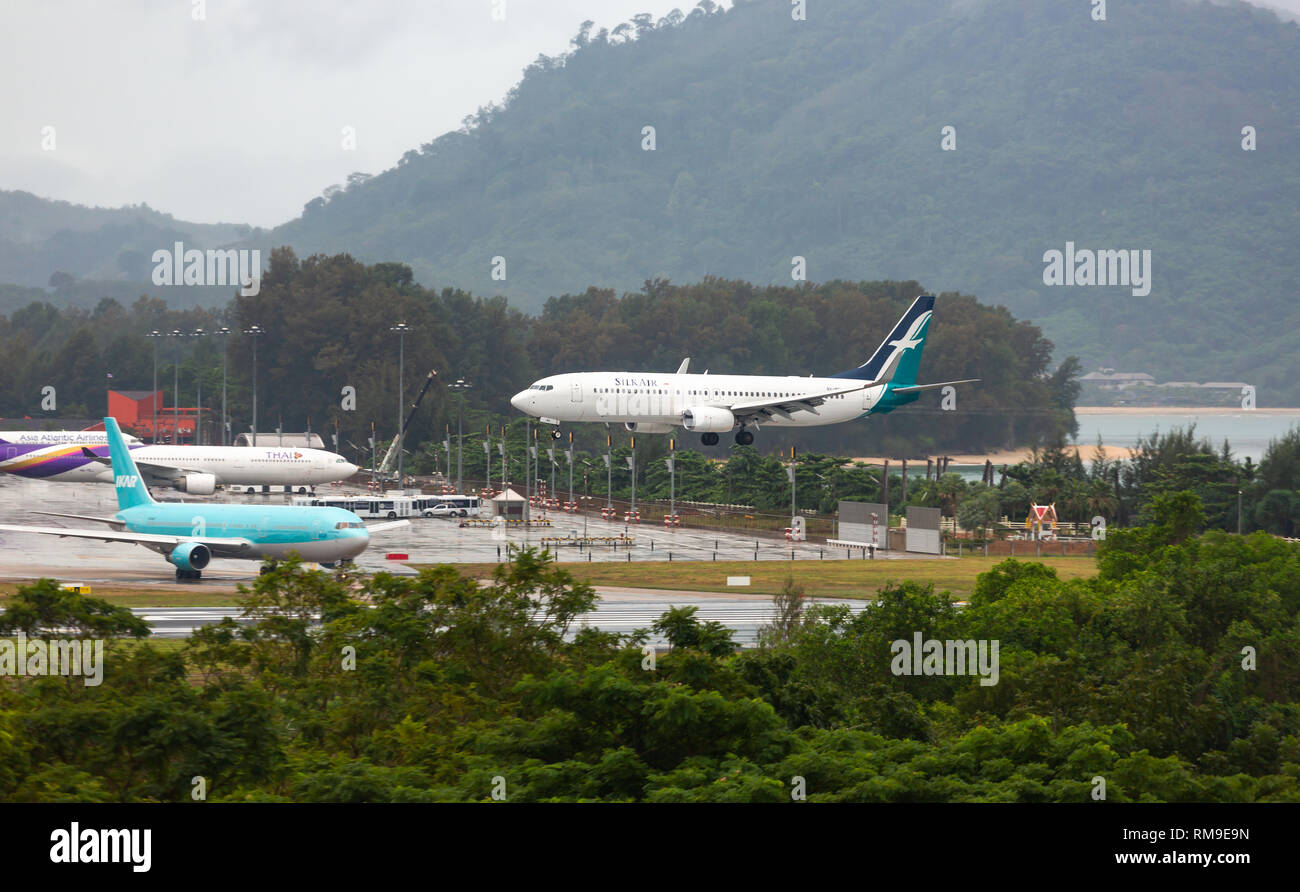 Aircraft fly in rainy weather Stock Photo - Alamy