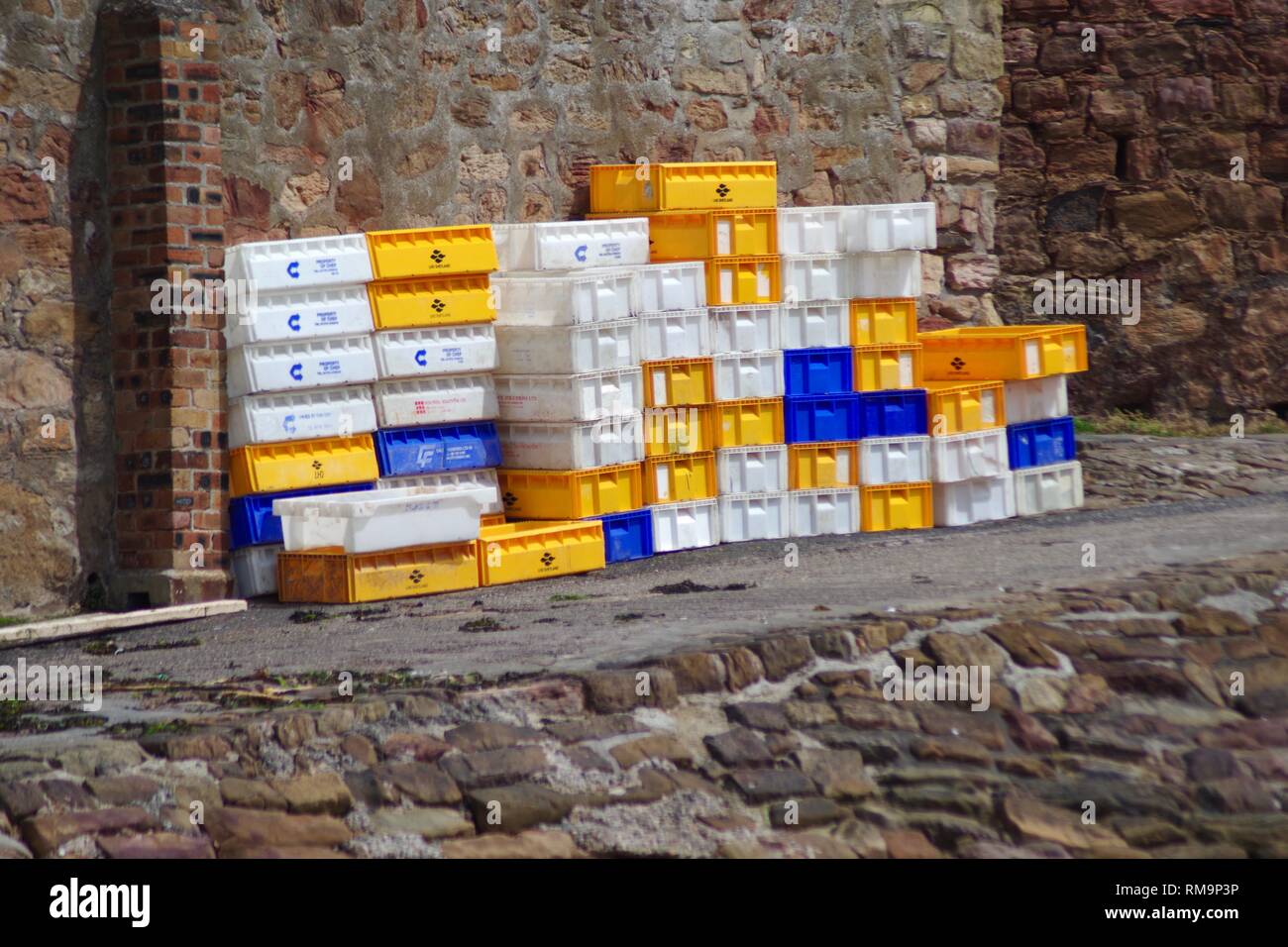 Stack of Plastic Fishing Crates at Crail Harbour. Fife, Scotland, UK ...