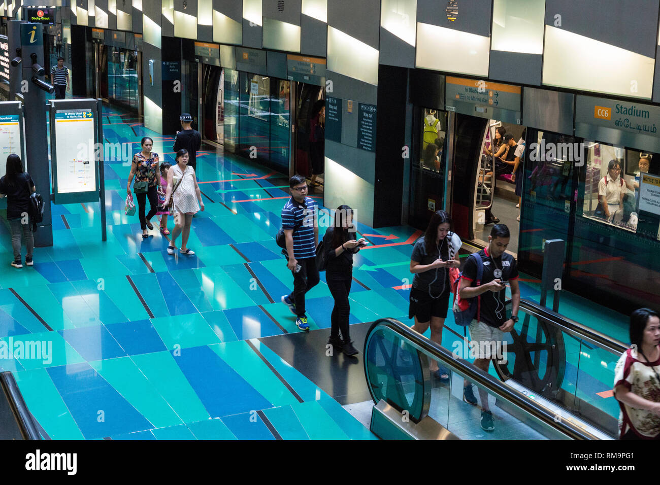 Singapore MRT Mass Rapid Transit Passengers Exiting Train at Stadium ...