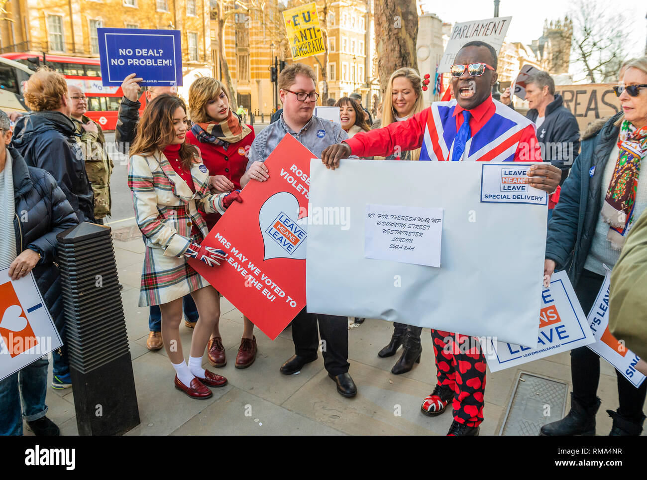 London, UK. 14th February, 2019. Harry Todd (pictured glasses) and his ...
