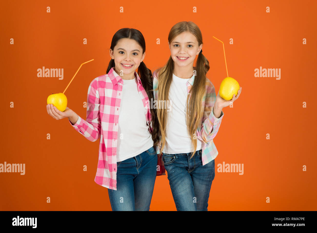 Distributing free fresh fruit at school. Girls kids casual style eat ...