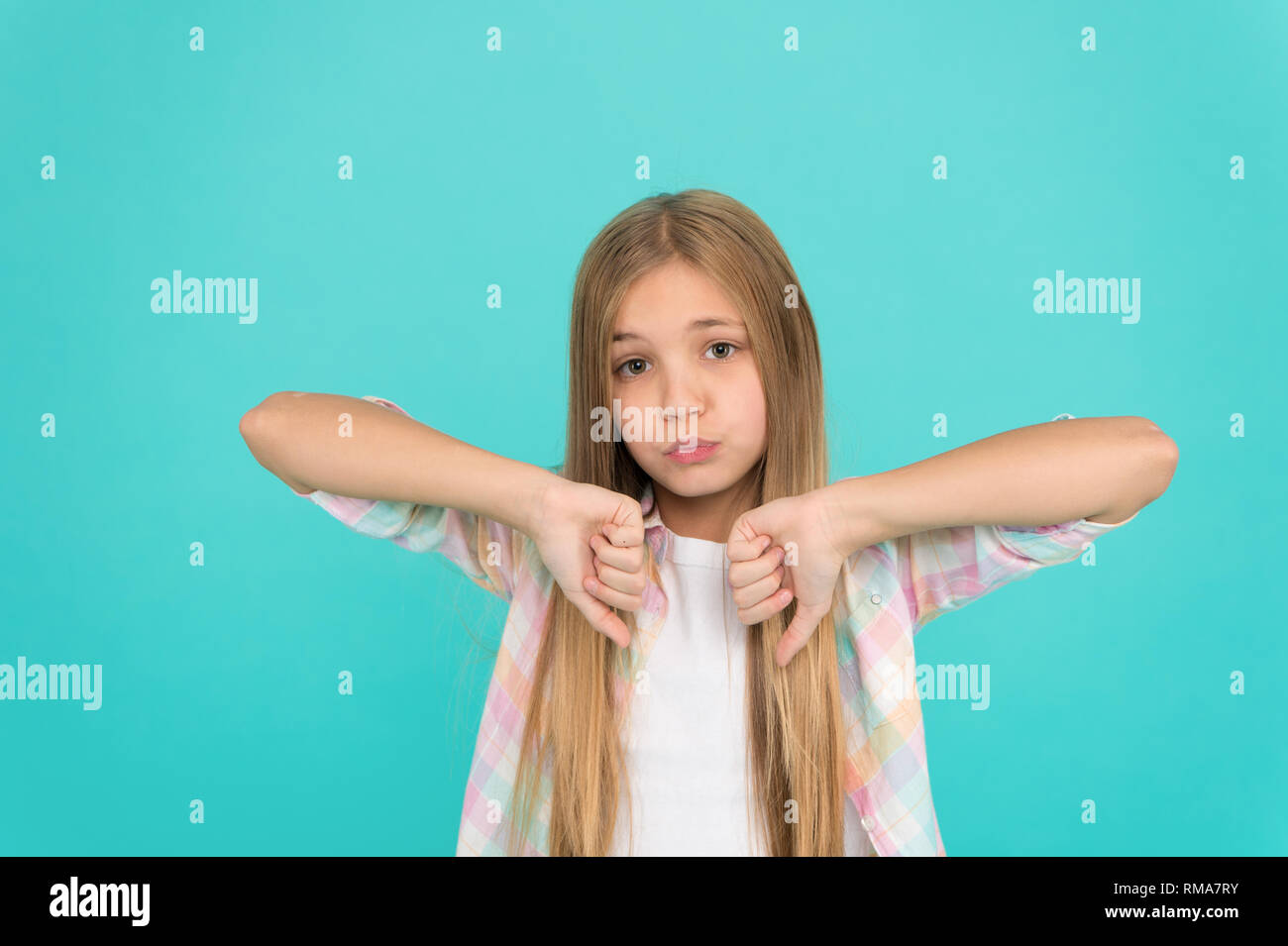 Thumbs down. Kid unhappy small baby. Dislikes concept. Reasons why kids ...