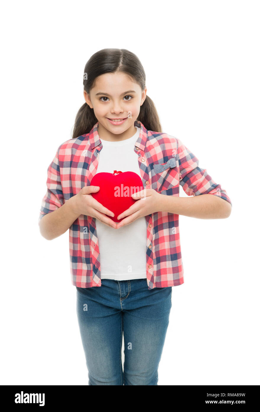 Her heart beating with love. Little child expressing love on valentines ...