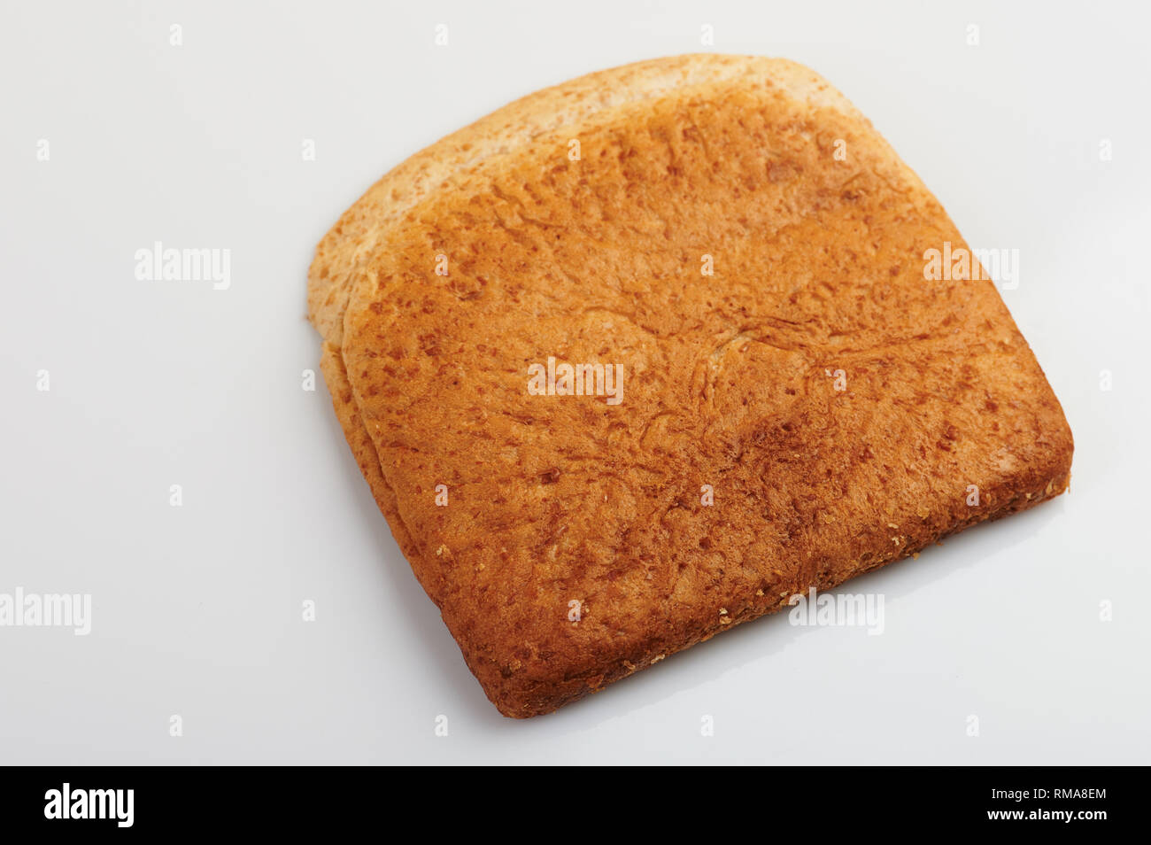 Back view of bread slice isolated on white background angle view Stock ...
