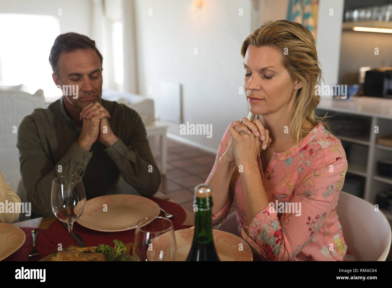 Couple praying together hi-res stock photography and images - Alamy