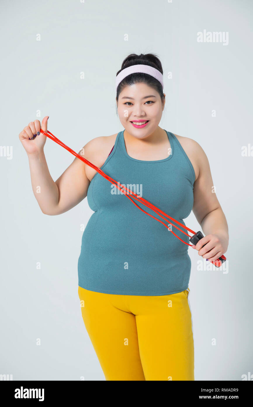 Large girl eating healthy foods and exercise for weight loss, diet ...