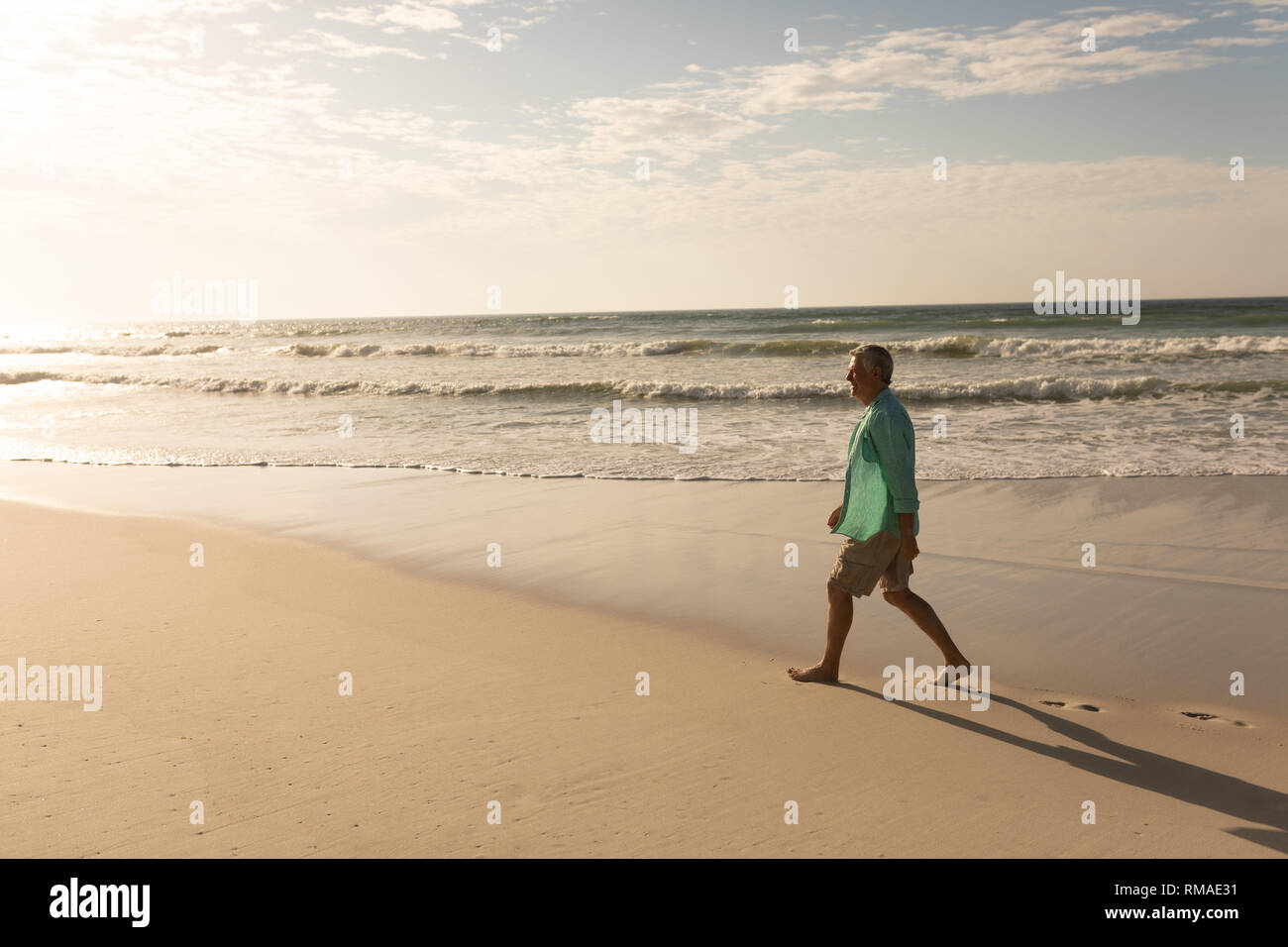 Vacation tourist beach man walking hi-res stock photography and images ...