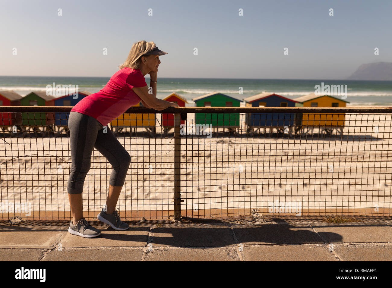 Leaning on a railing hi-res stock photography and images - Alamy