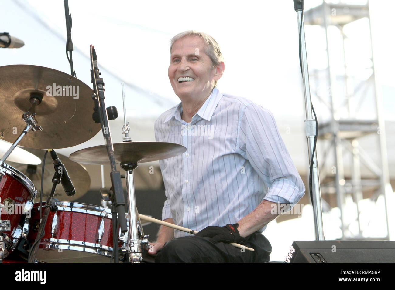Musician Levon Helm is shown performing on stage during a "live ...