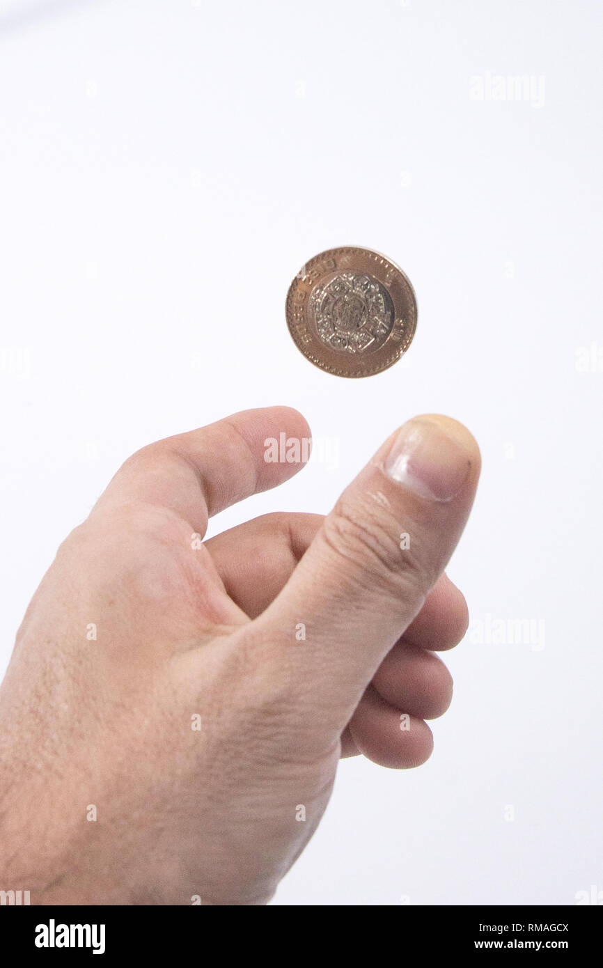 Throwing a coin hi-res stock photography and images - Alamy