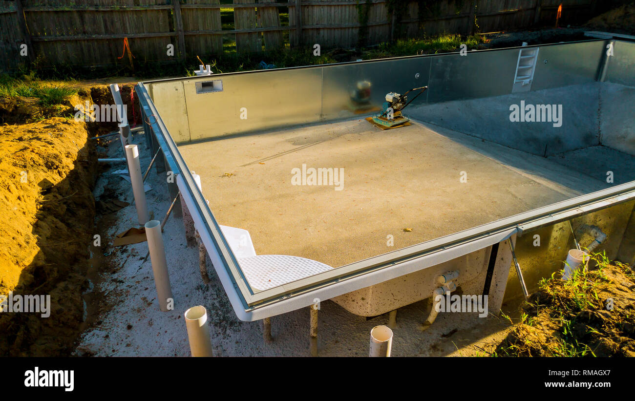 Swimming pool under construction works for the installation of a ...