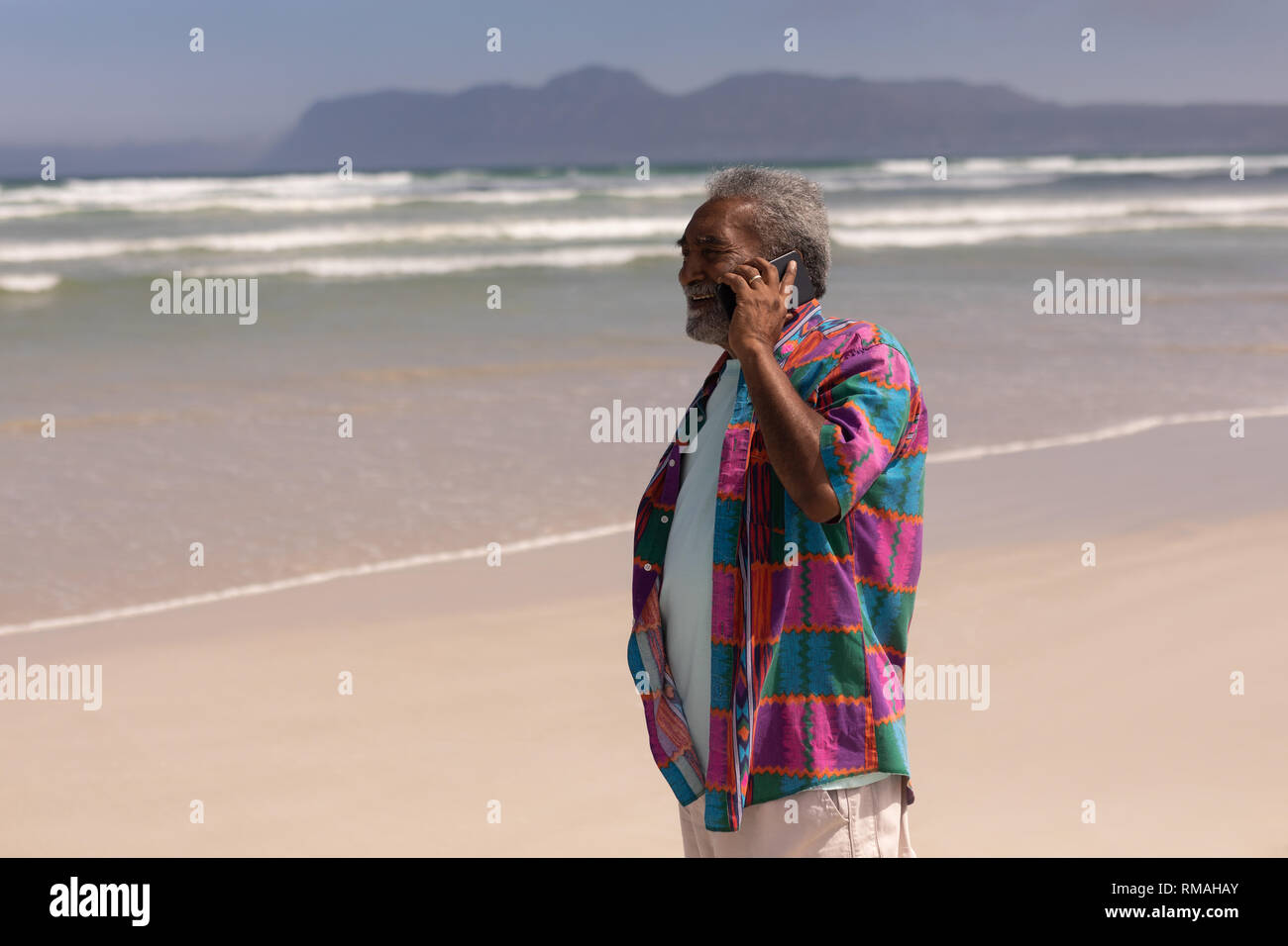 Talking speaking at the beach hi-res stock photography and images - Alamy