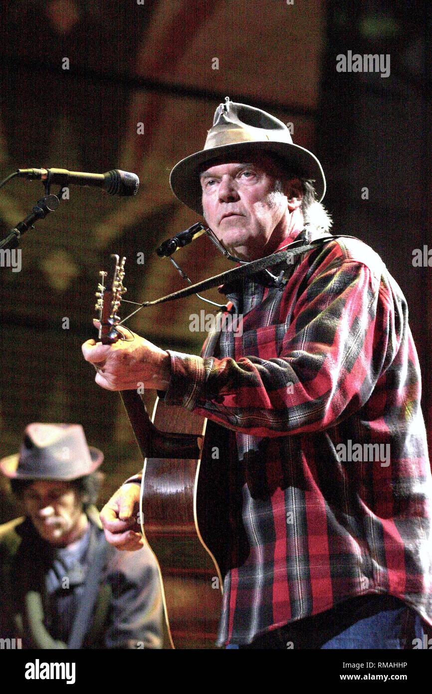 Singer, songwriter, and guitarist Neil Young is shown performing on ...