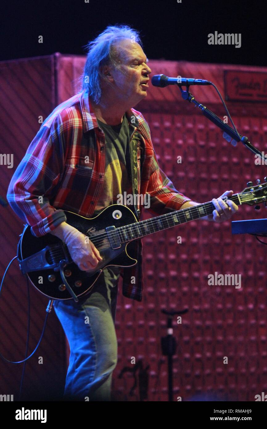 Singer, songwriter, and guitarist Neil Young is shown performing on ...