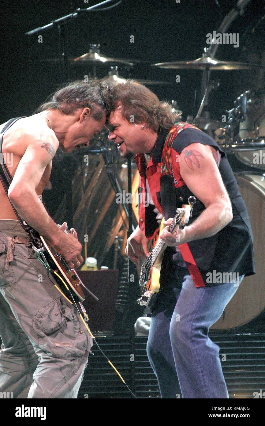 Bassist Michael Anthony and Eddie Van Halen are shown having some fun ...