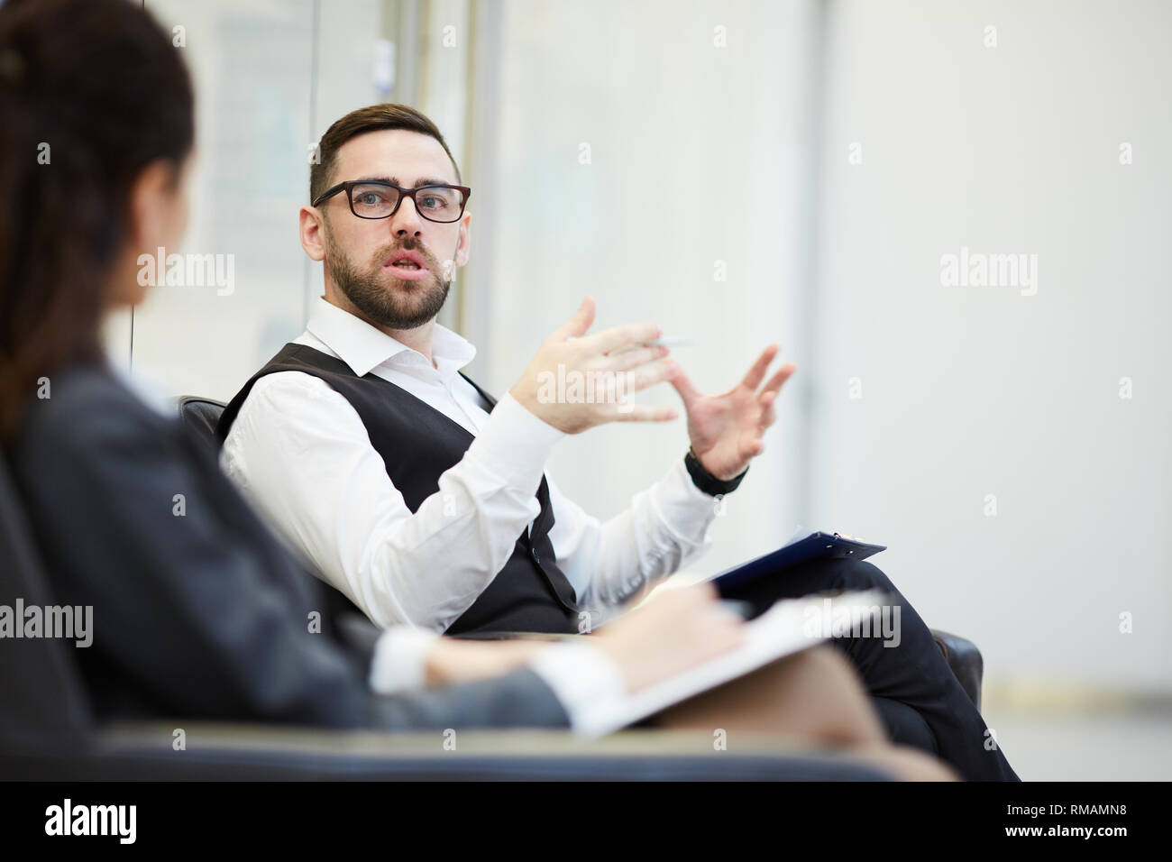 Explaining agent hi-res stock photography and images - Alamy