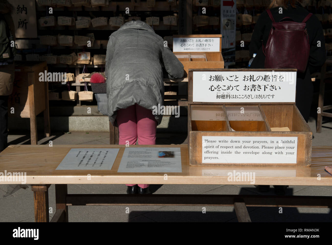 Prayer shrine, Woman writing prayer on Ema, picture-horse in Japanese ...