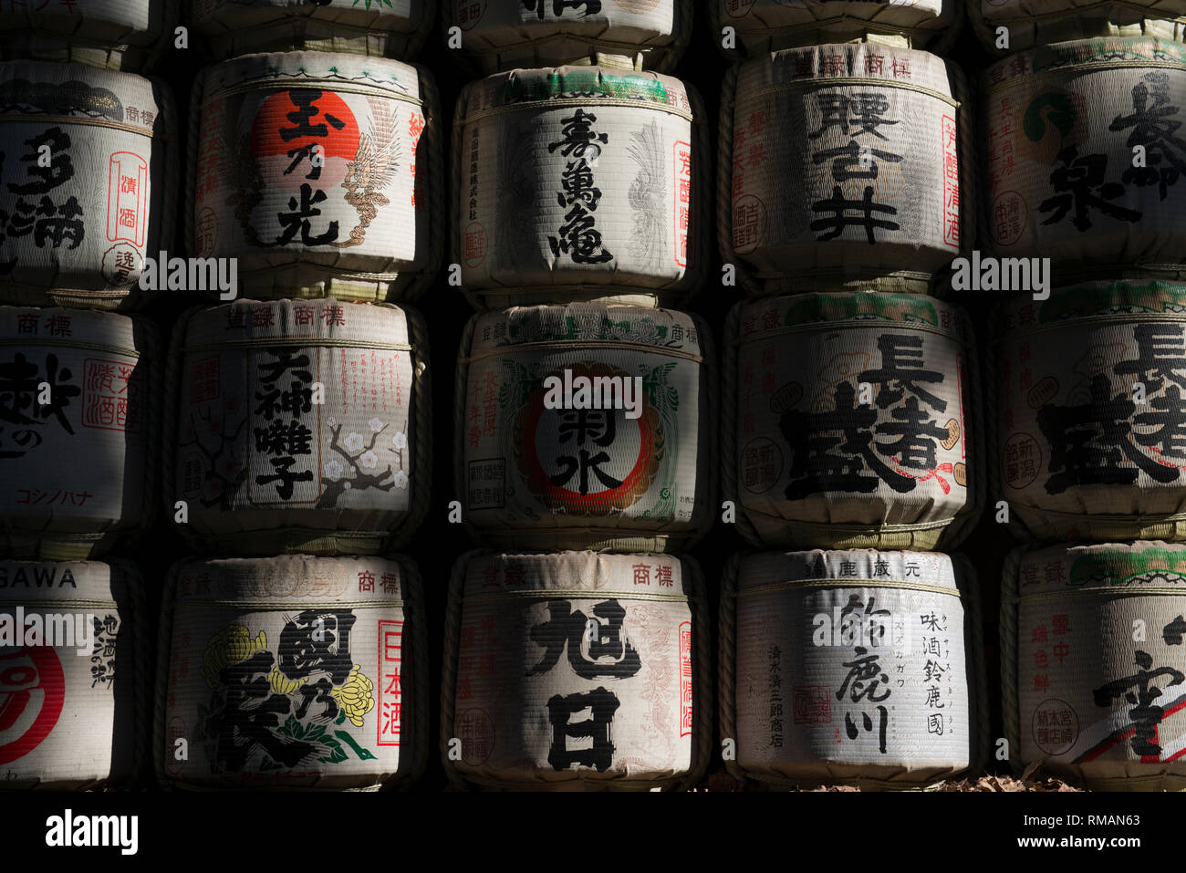 Sake barrels, wrapped in straw, Meiji Jingu Shrine, Shibuya, Tokyo ...