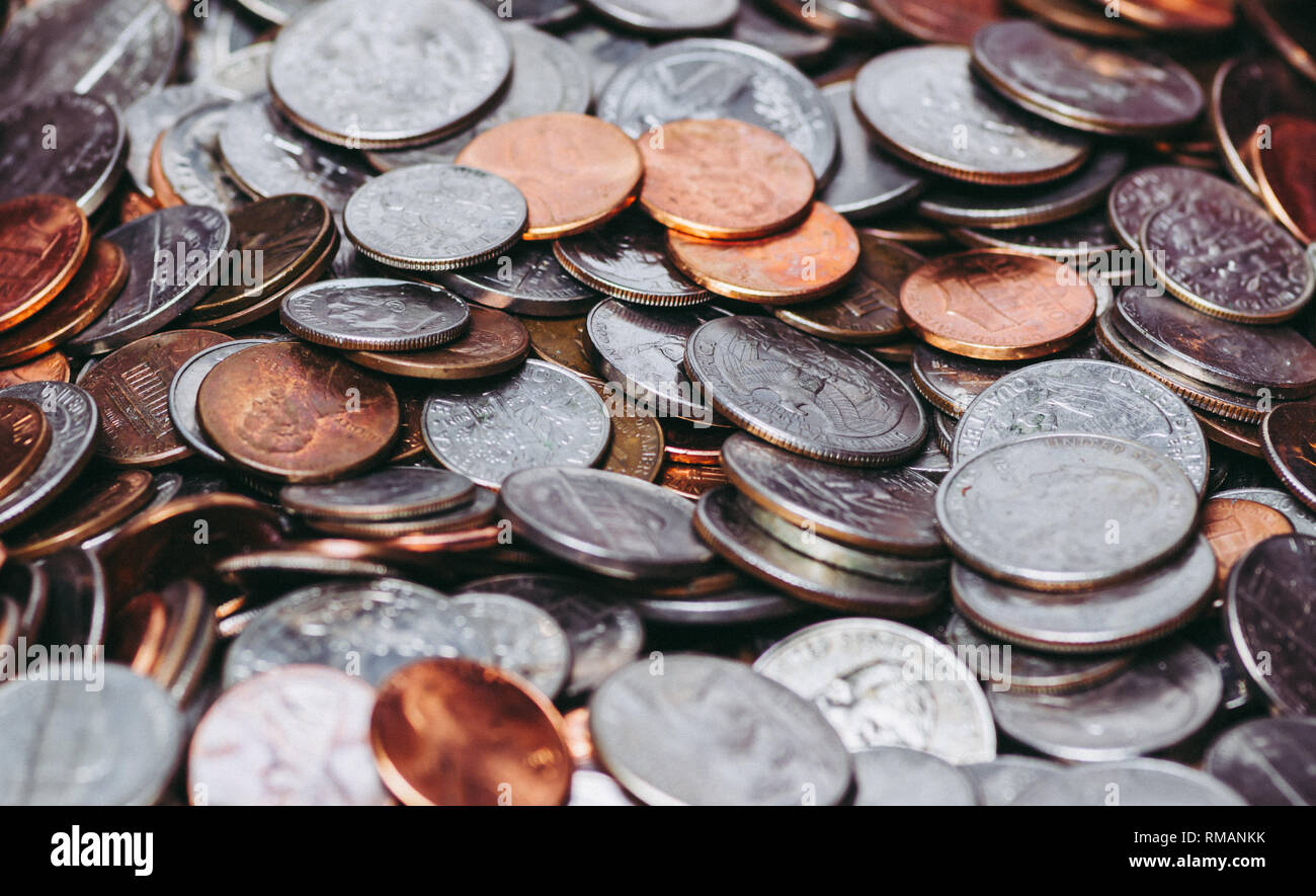 pile of coins Stock Photo - Alamy
