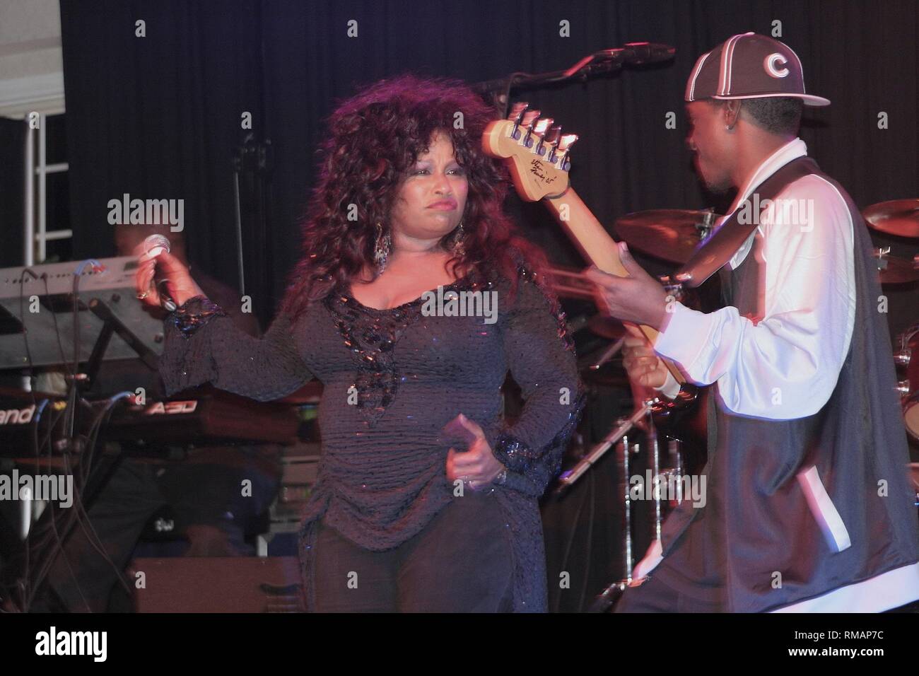Singer Chaka Kahn is shown performing on stage during a "live" concert ...