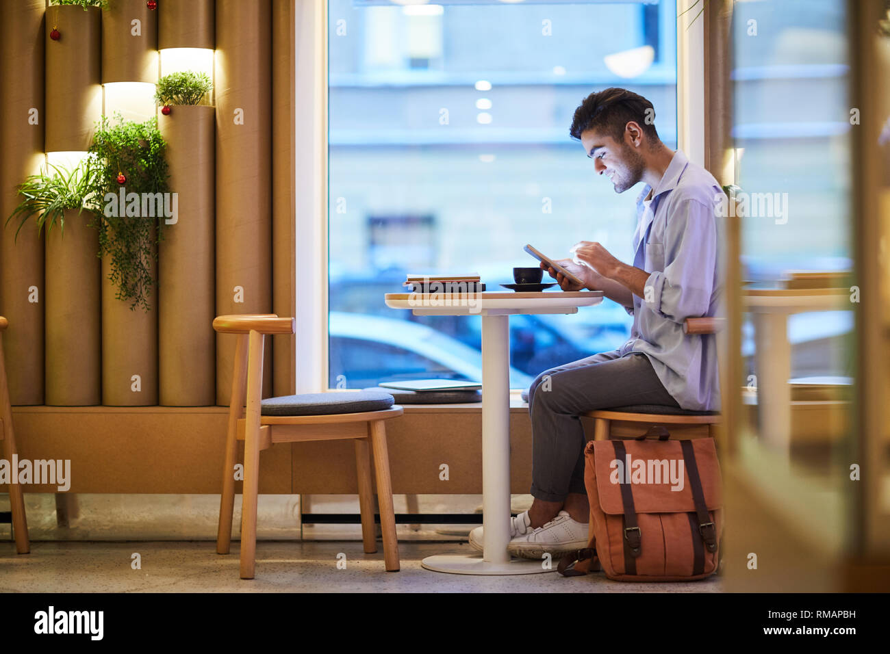 Guy with touchpad Stock Photo - Alamy