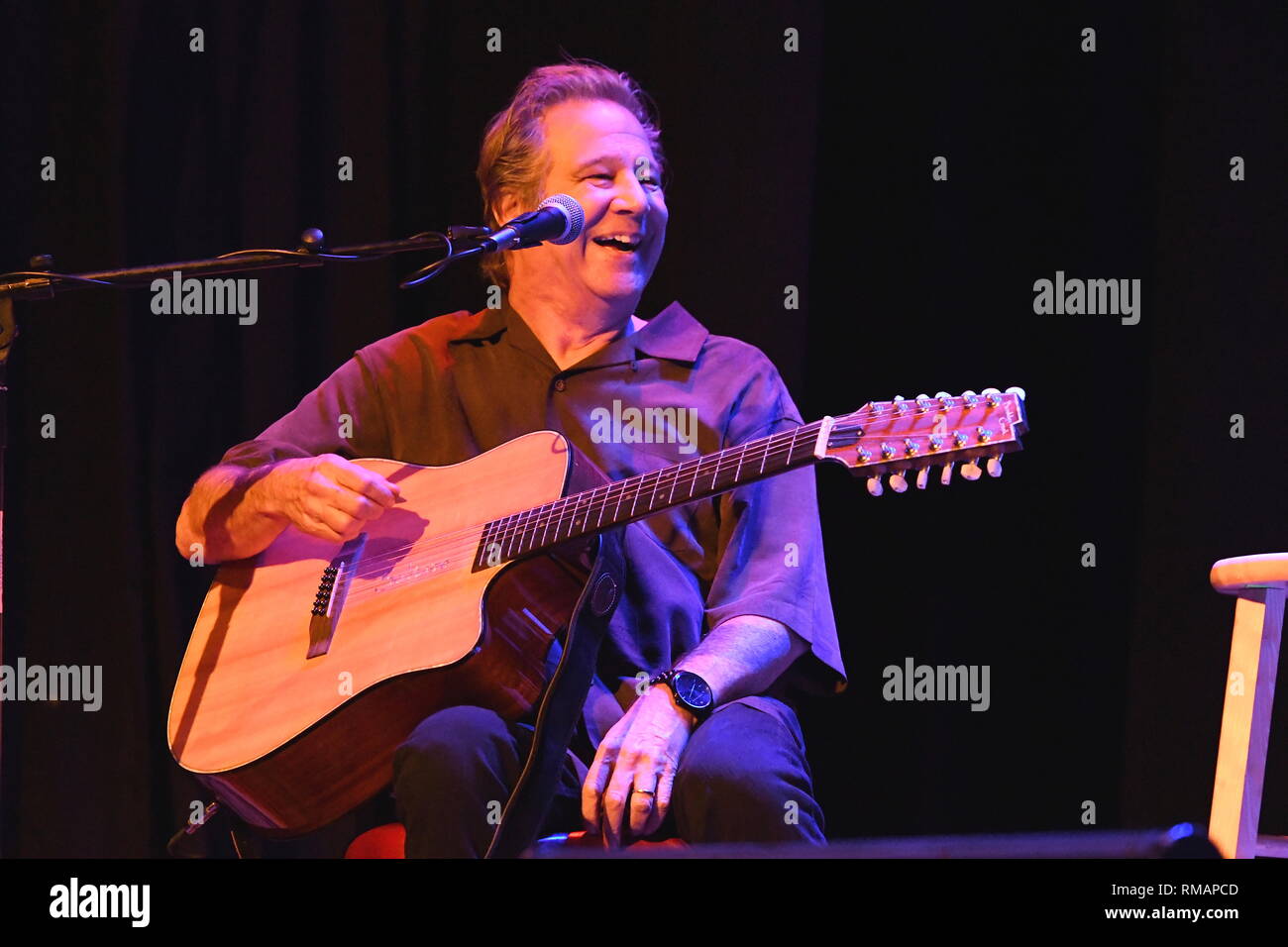 Musician, radio personality, and novelist, Greg Kihn, is shown ...