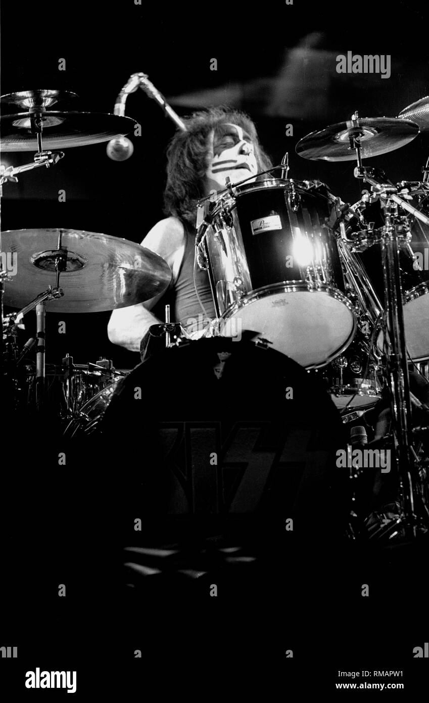 Drummer Peter Criss is shown performing on stage during a "live ...