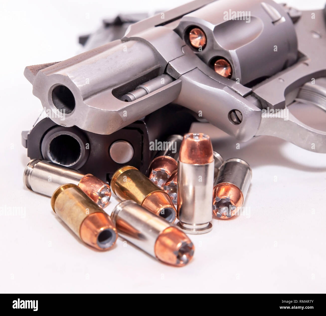 Two handguns, a 40 caliber pistol and a 357 magnum revolver with 40 ...