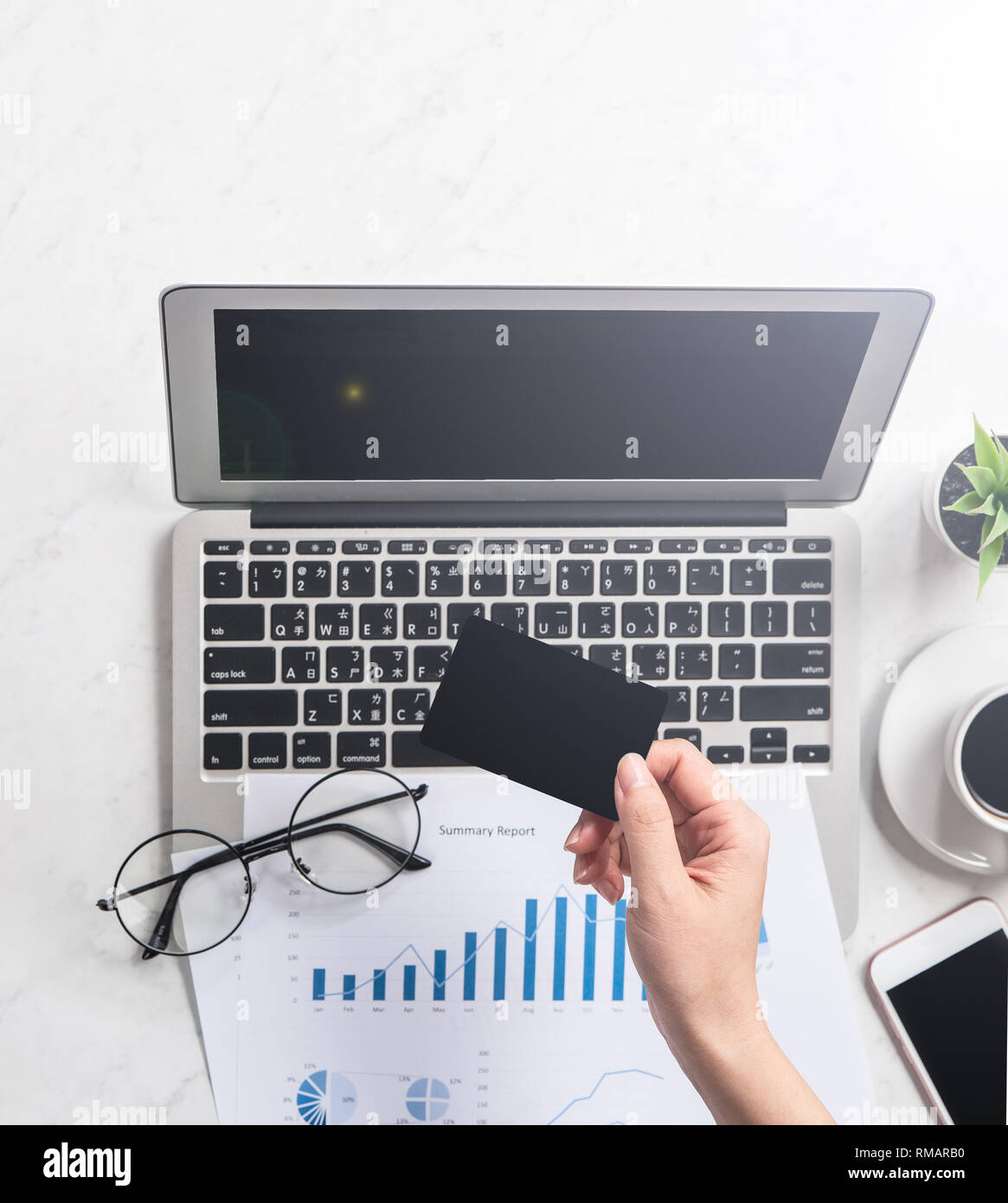 Concept of a woman is doing a online purchase, mock up card and ...