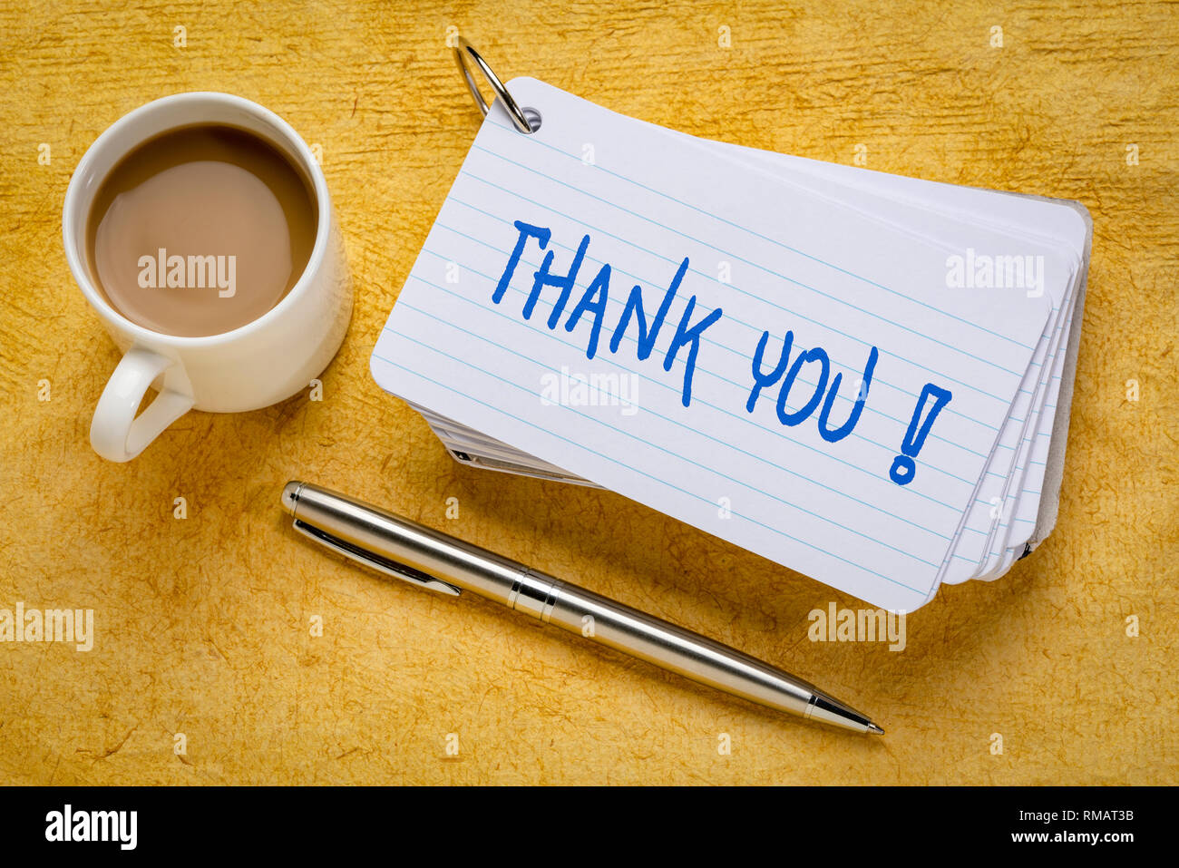 thank you - handwriting on a stack of index cards with a cup of coffee ...