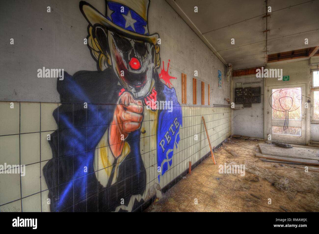 Pete One graffiti in abandoned school in Belgium Stock Photo - Alamy