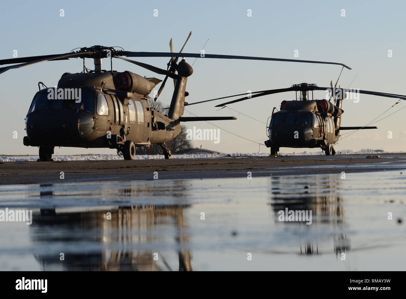 Two U.S. Army UH-60 Black Hawk helicopters of the 1st Combat Aviation ...