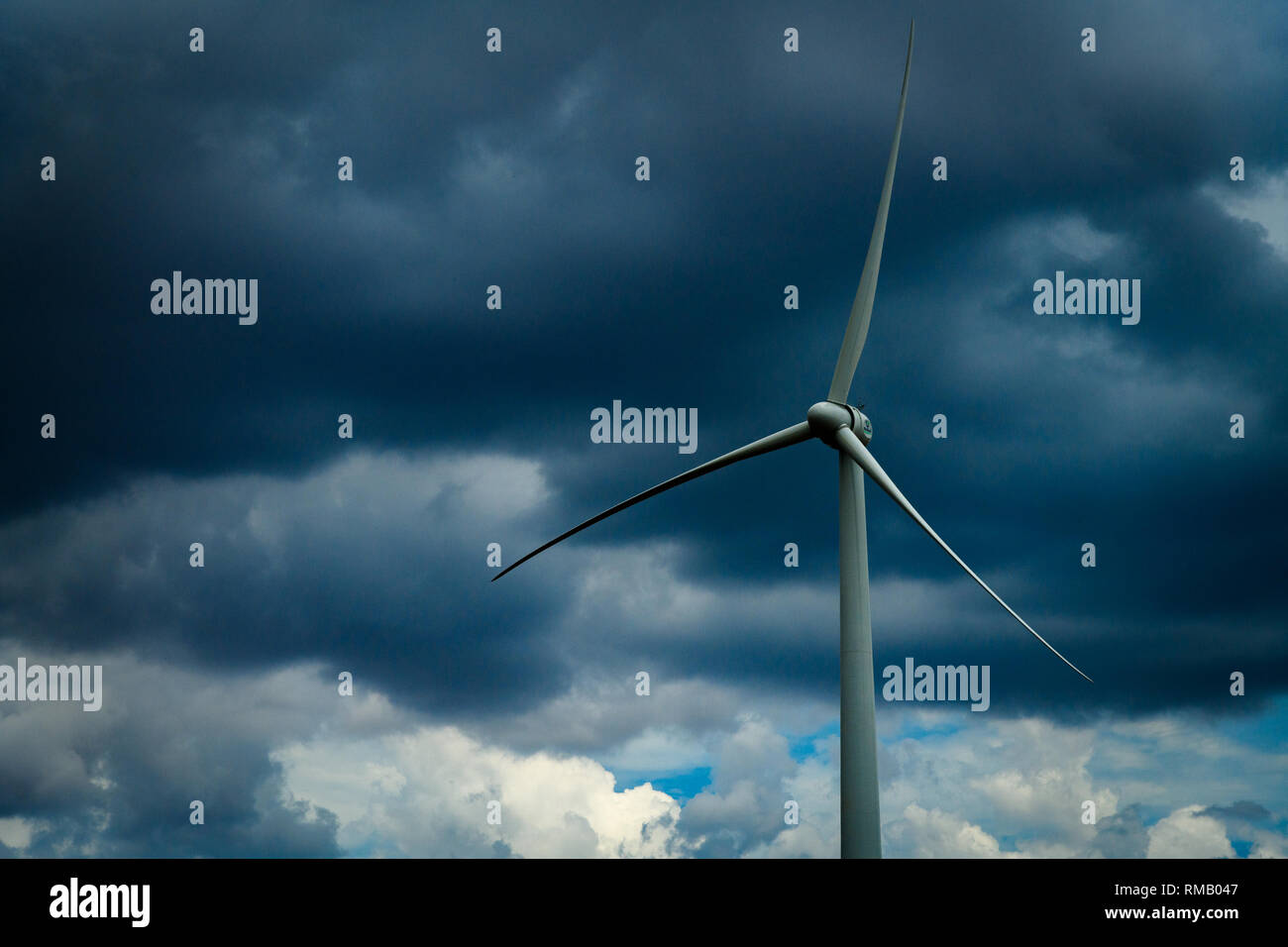 Three bladed wind turbine Stock Photo - Alamy