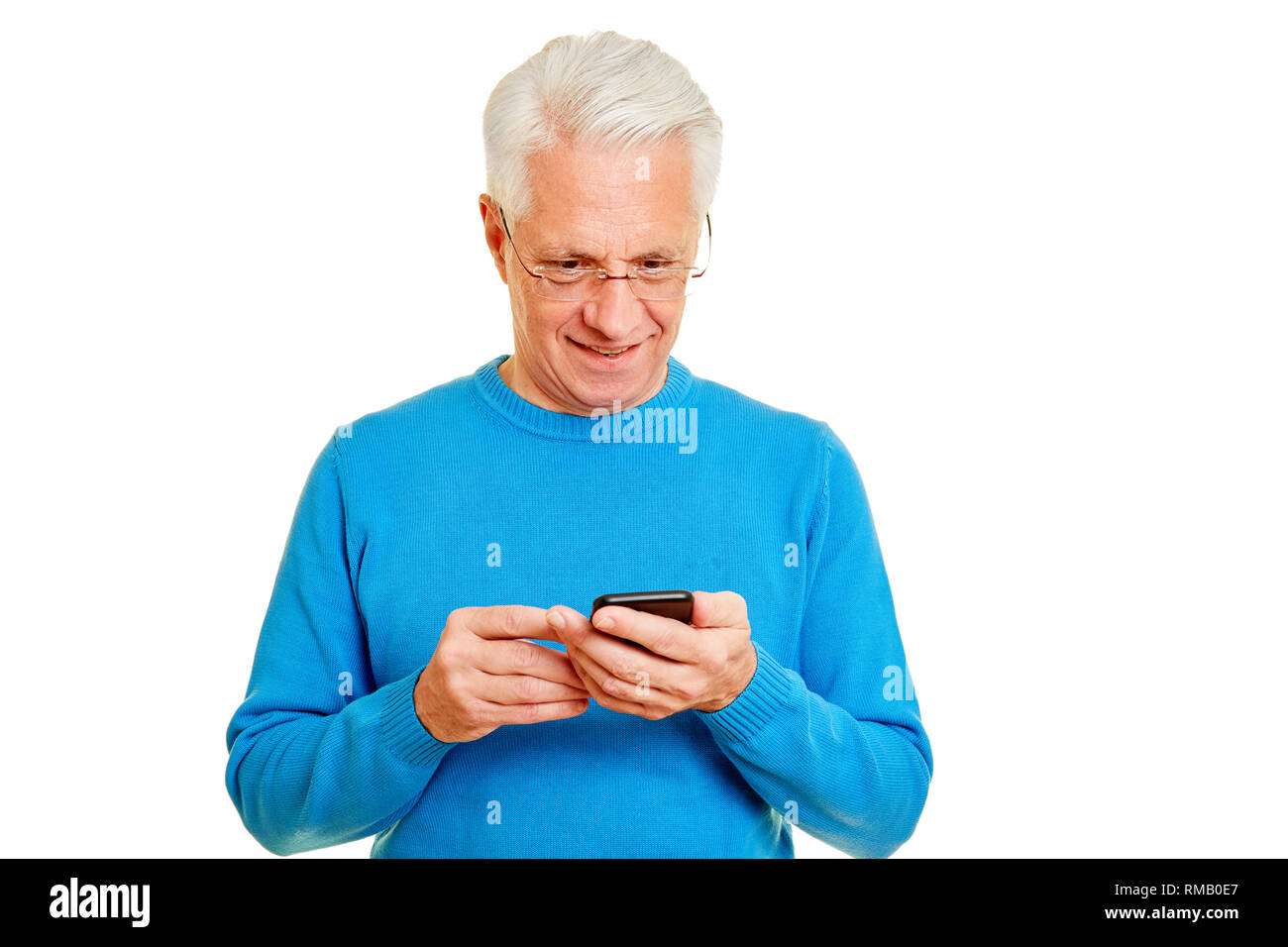 Old man with smartphone is reading a text message Stock Photo - Alamy
