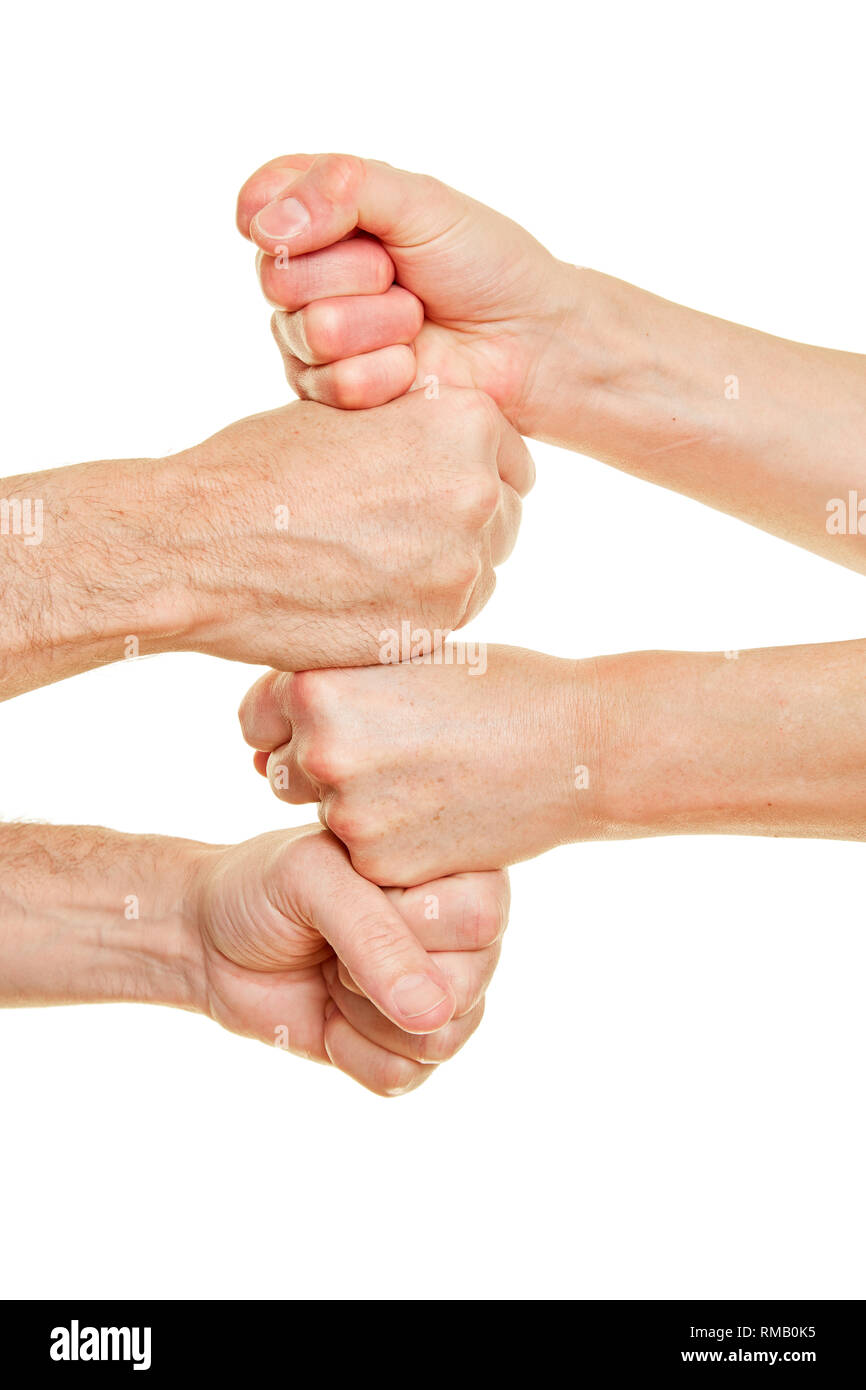 People are stacking four fists as a collaboration concept Stock Photo ...
