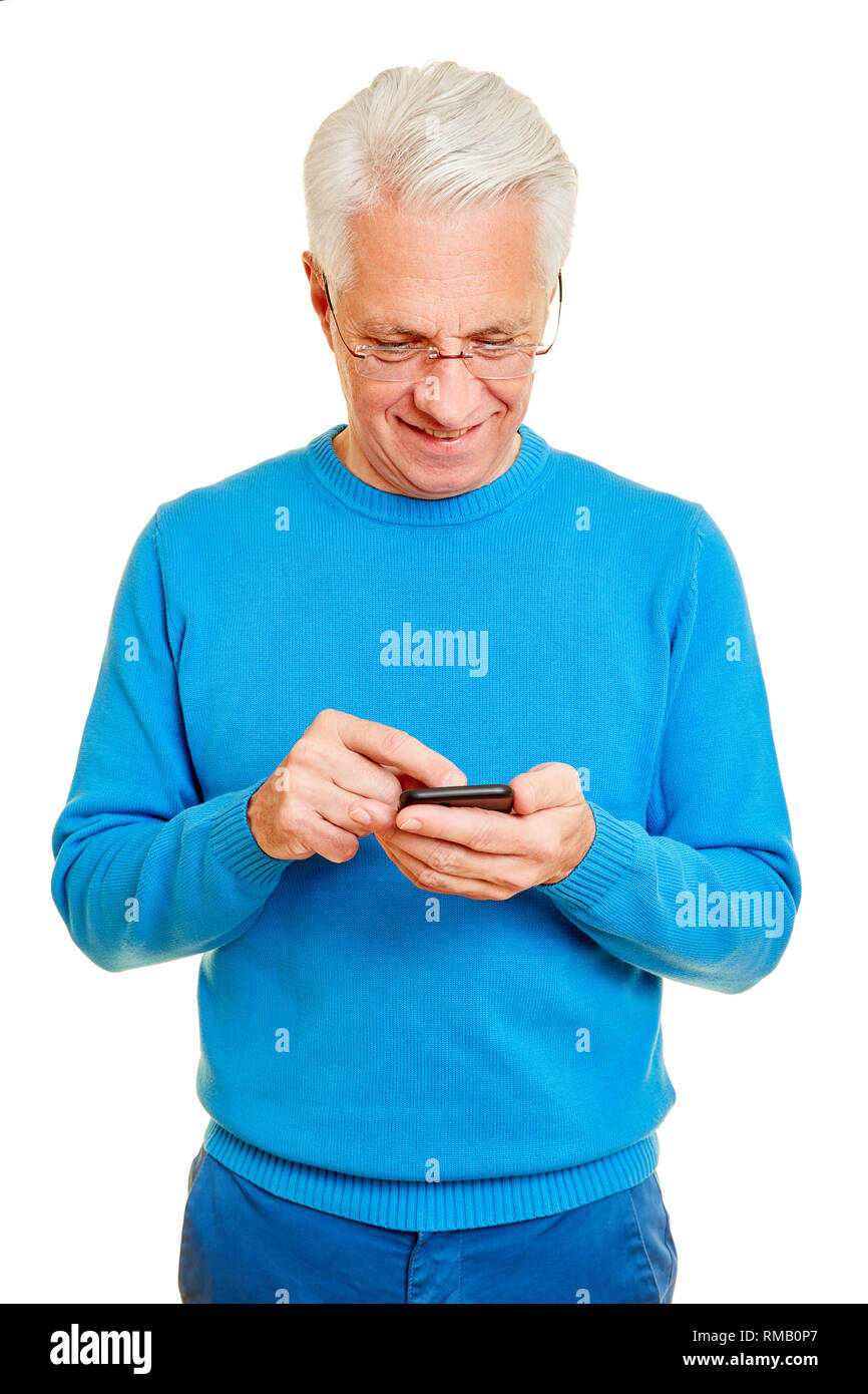 Senior types text message in smartphone communication Stock Photo - Alamy