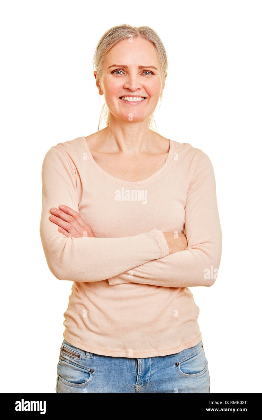 Happy smiling older woman from front with crossed arms Stock Photo - Alamy