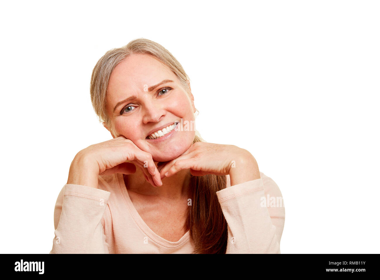 Older woman smiles contentedly from the front into the camera Stock ...