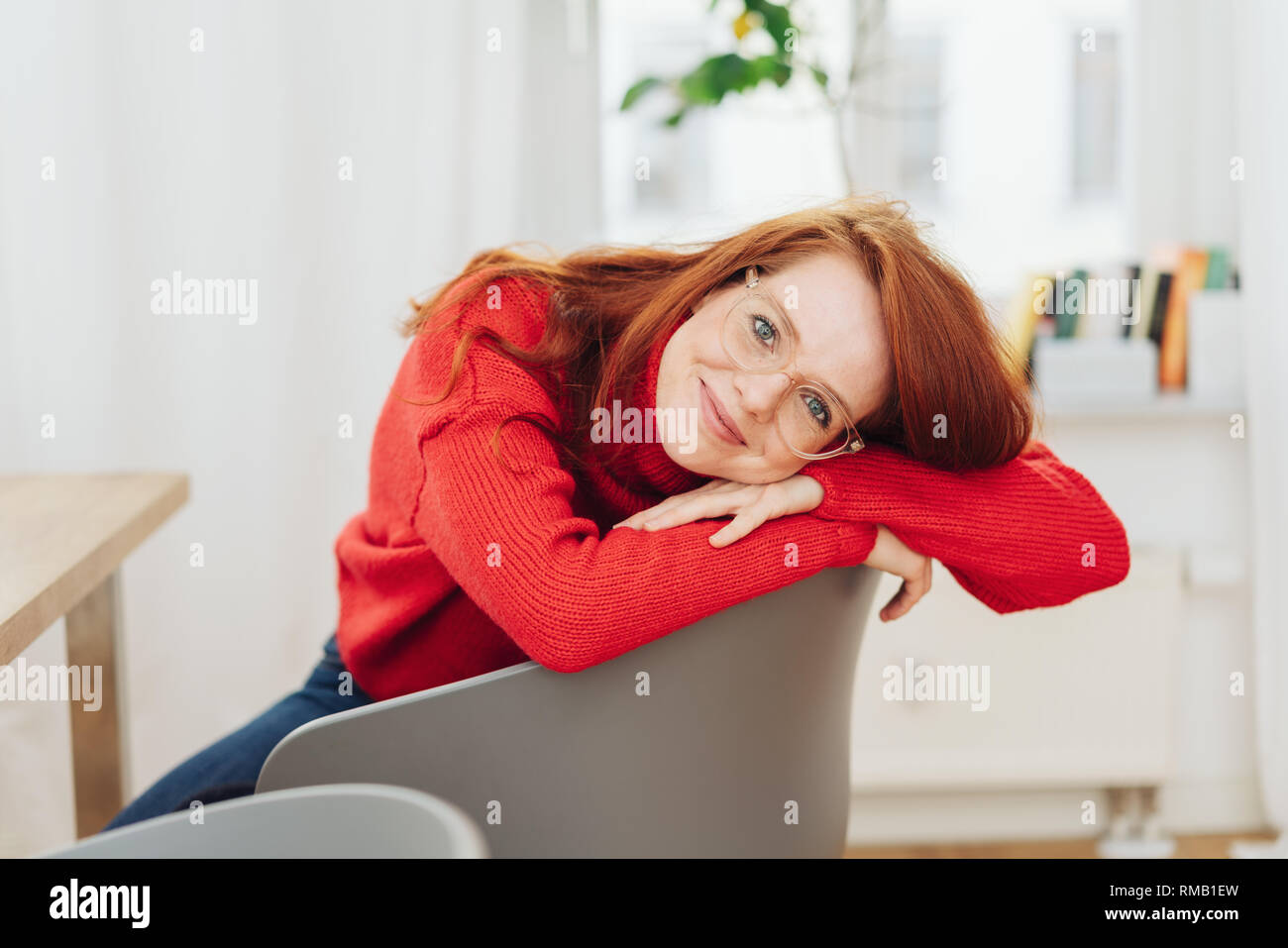Resting arms on back of armchair hi-res stock photography and images ...