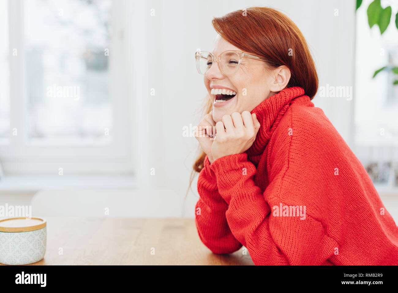 Young woman laughing out loud hi-res stock photography and images - Alamy