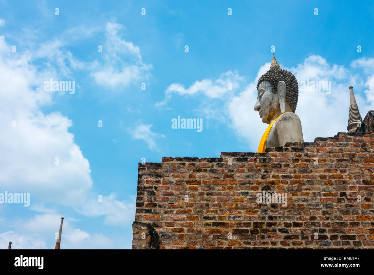 Old Brick Wall Texture and Big buddha on Blue sky Stock Photo - Alamy
