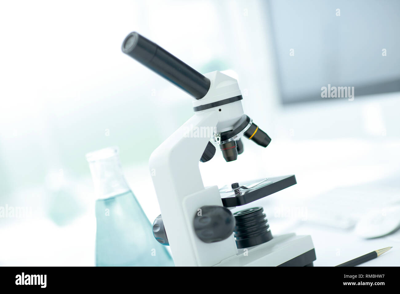 close up.microscope on the table in the science lab Stock Photo - Alamy