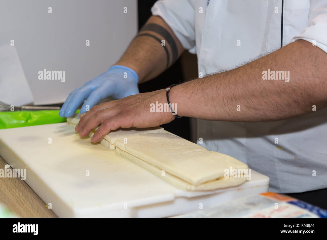 Chef Preparing Sandwiches on a Chopping Board Stock Photo - Alamy