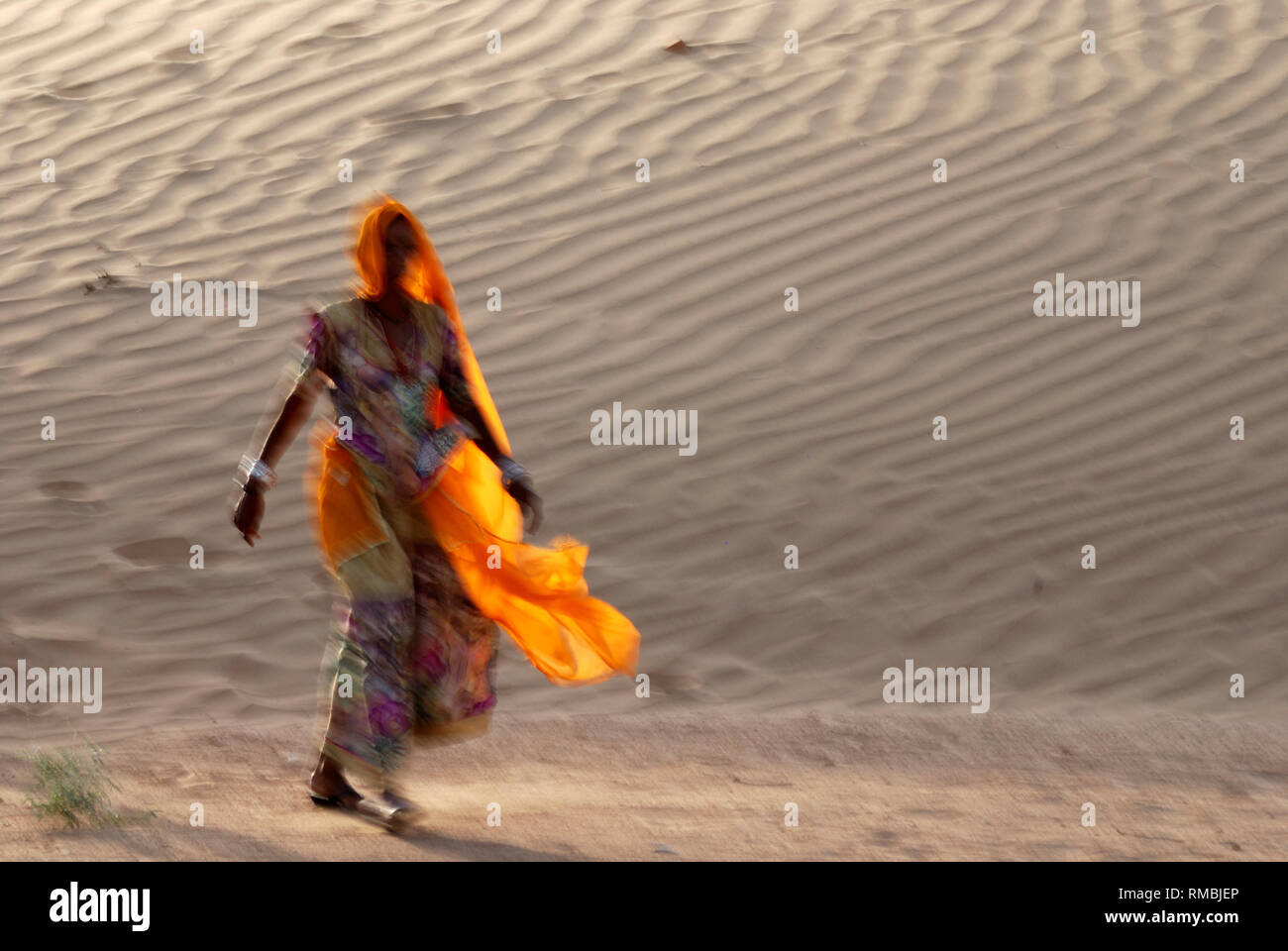Woman walking Dechu desert, Jodhpur, Rajasthan, India, Asia Stock Photo ...