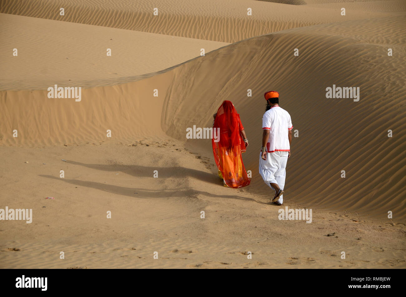 Couple walking in Dechu desert, Jodhpur, Rajasthan, India, Asia Stock ...