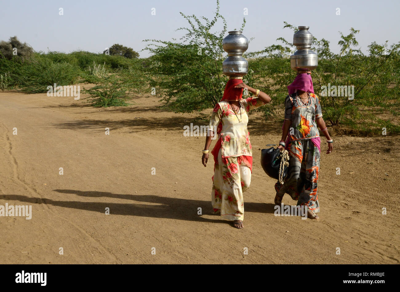 Balancing Pot On Head High Resolution Stock Photography and Images - Alamy
