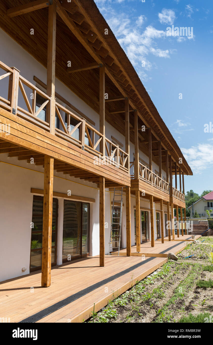 Modern wooden alpine Style Architecture with Balcony and varnished ...